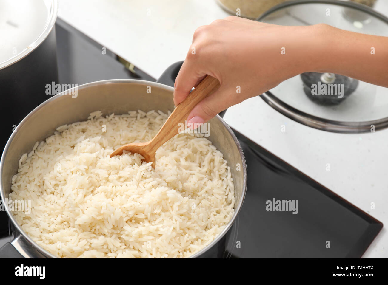 Stirring rice cooker hi-res stock photography and images - Alamy