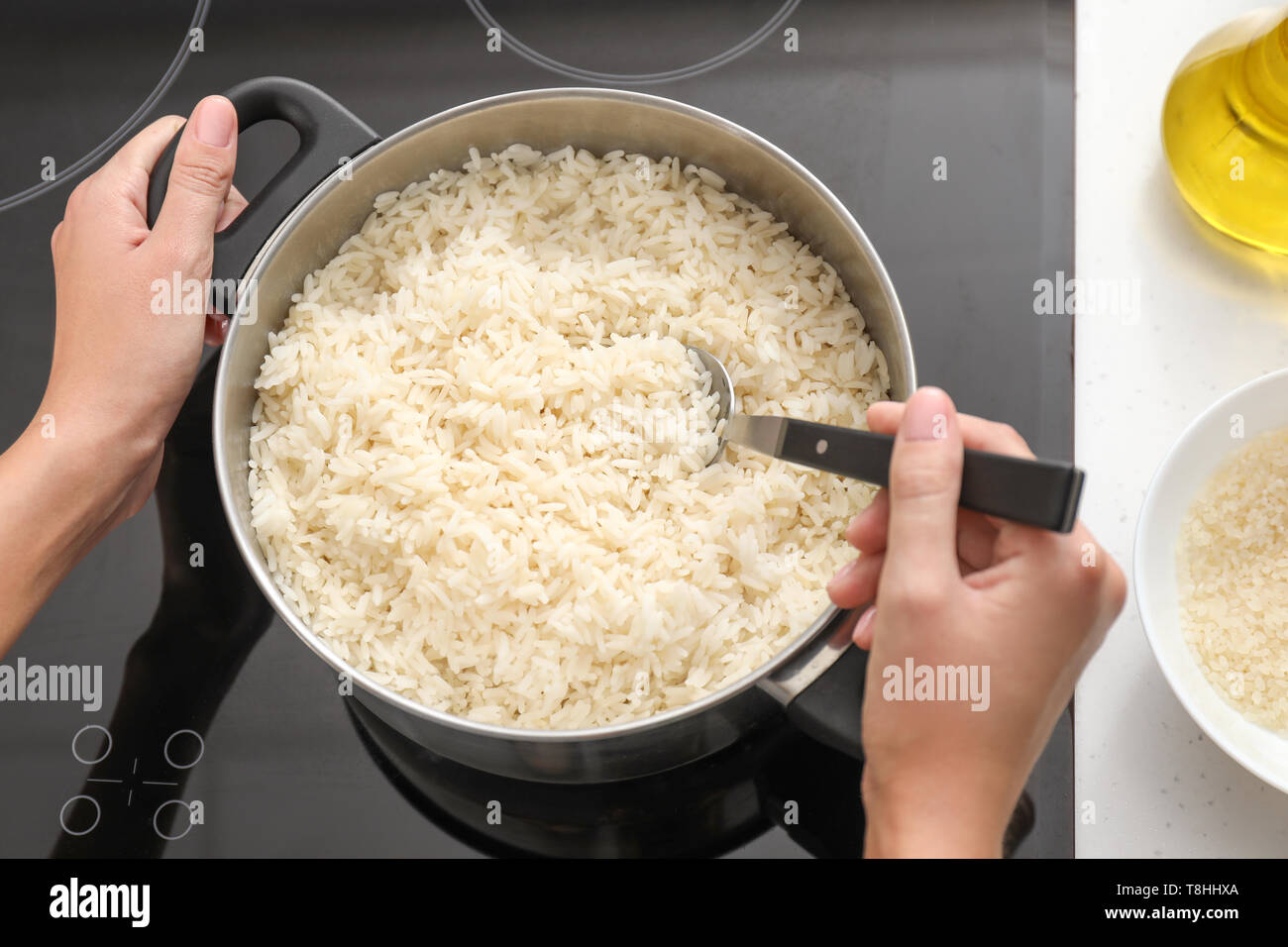Cooking pot rice on stove hi-res stock photography and images - Alamy