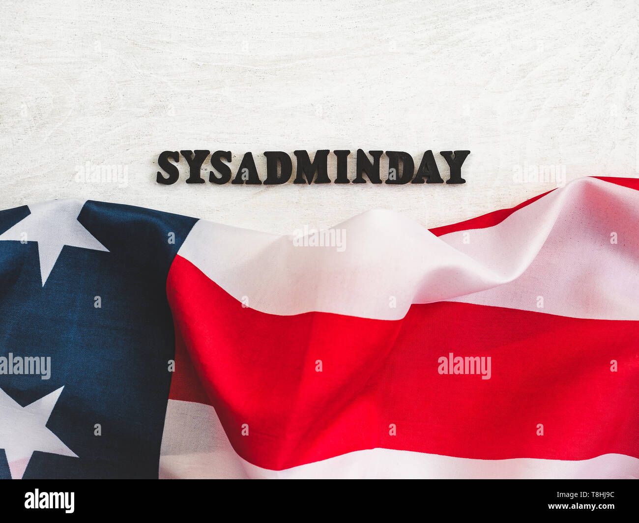 Beautiful greeting card for Sysadmin Day. Wooden letters with a ...