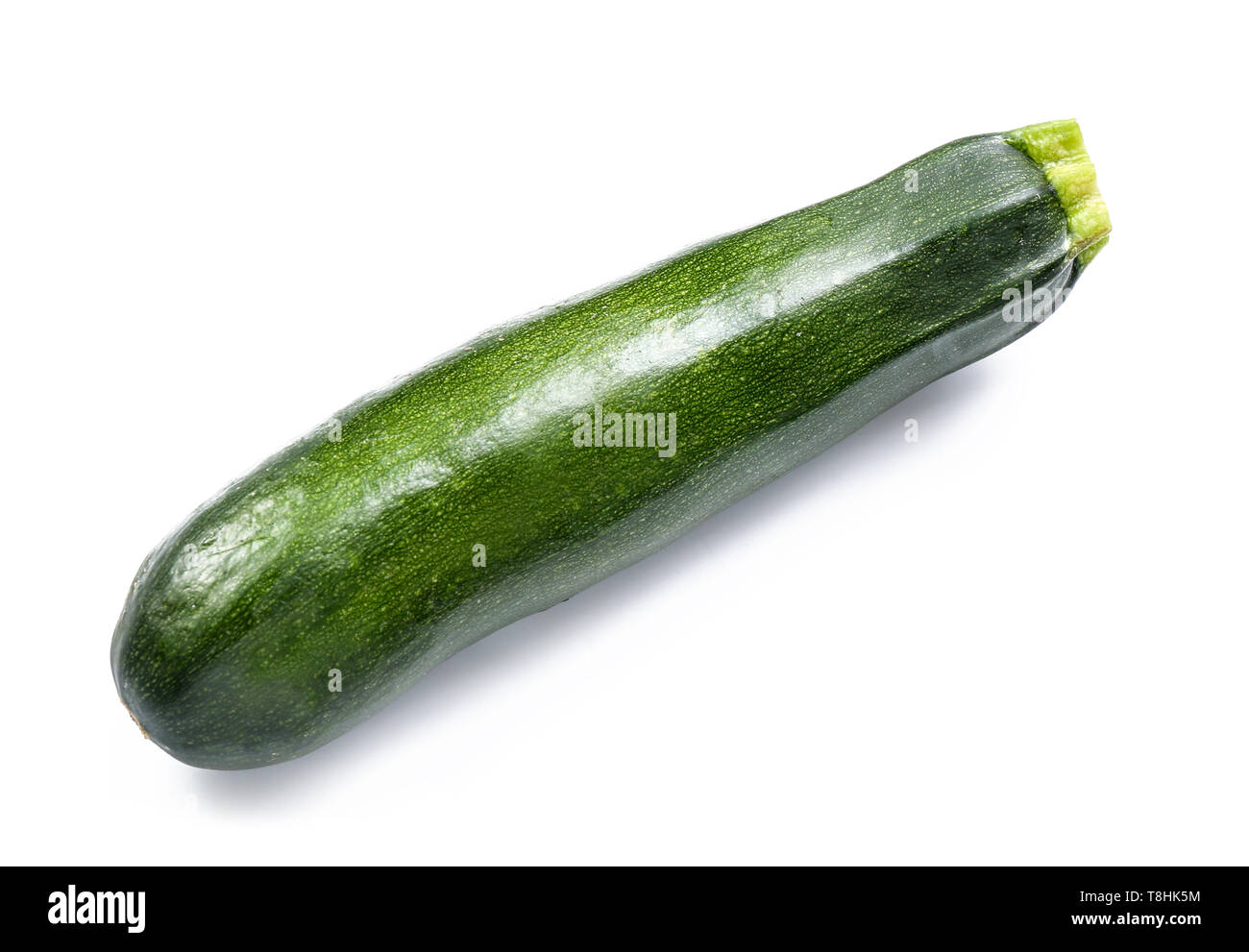 Fresh zucchini on white background Stock Photo - Alamy