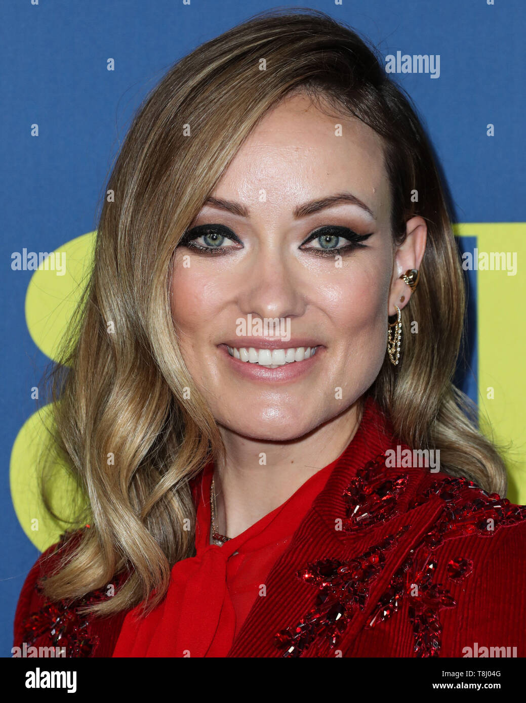 Actress Olivia Wilde wearing a Dundas suit, Giuseppe Zanotti shoes and ...