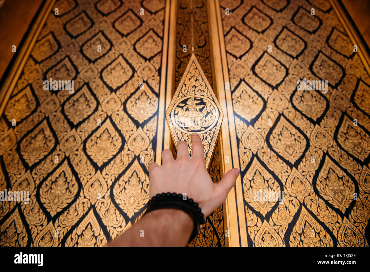 Touching temple hi-res stock photography and images - Alamy
