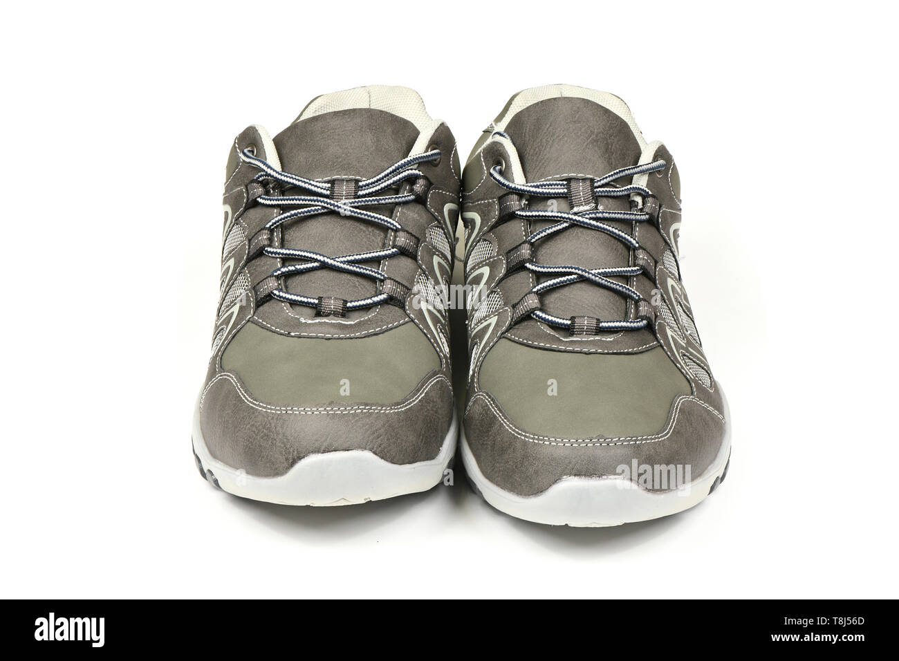 Pair gray modern sneakers isolated on a white background. View from the ...