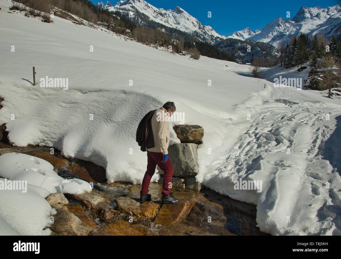Switzerland winter snow man walking hi-res stock photography and images ...
