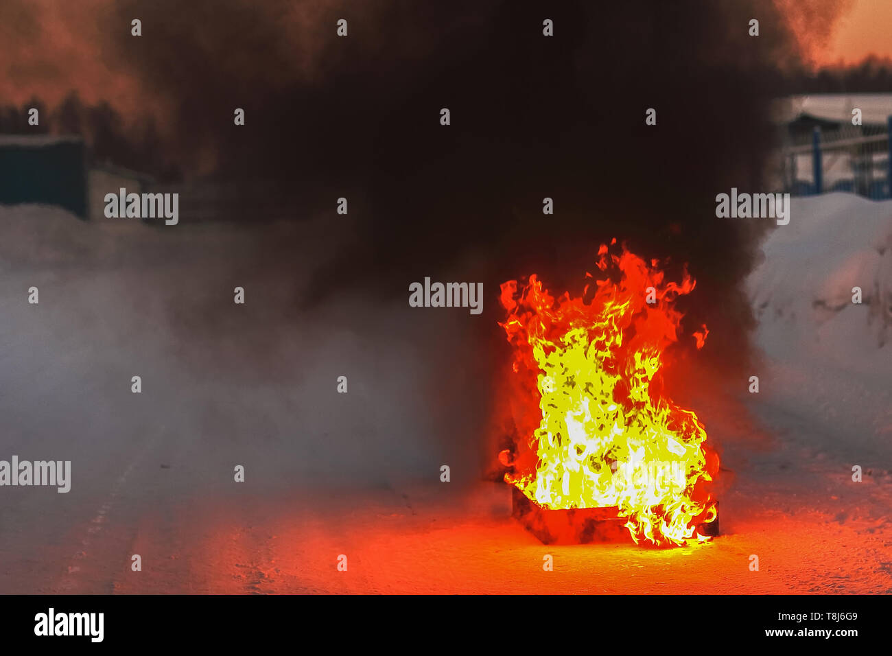 Fire, flames and black smoke. Preparation for training on fire ...