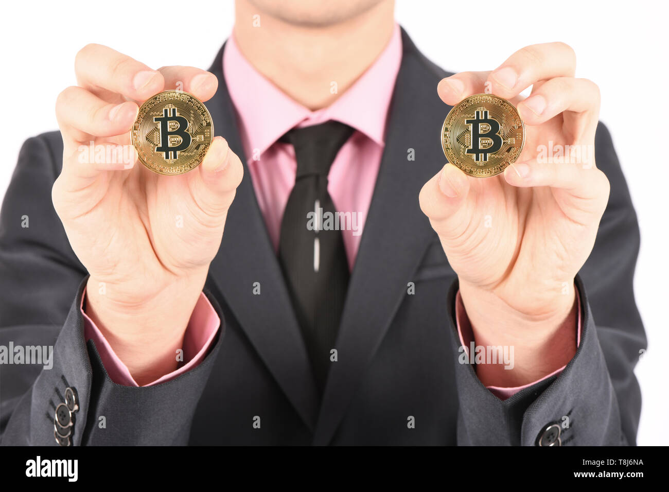 Man holding golden Bitcoin isolated on white background. High ...