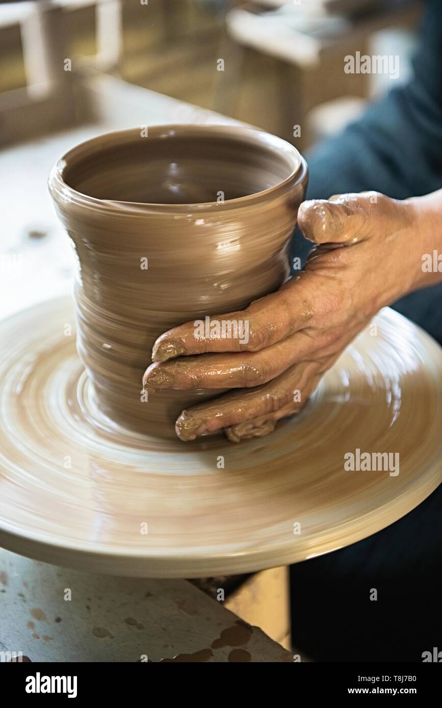 A lace maker and ceramicist create artwork. Hands top view Stock Photo ...