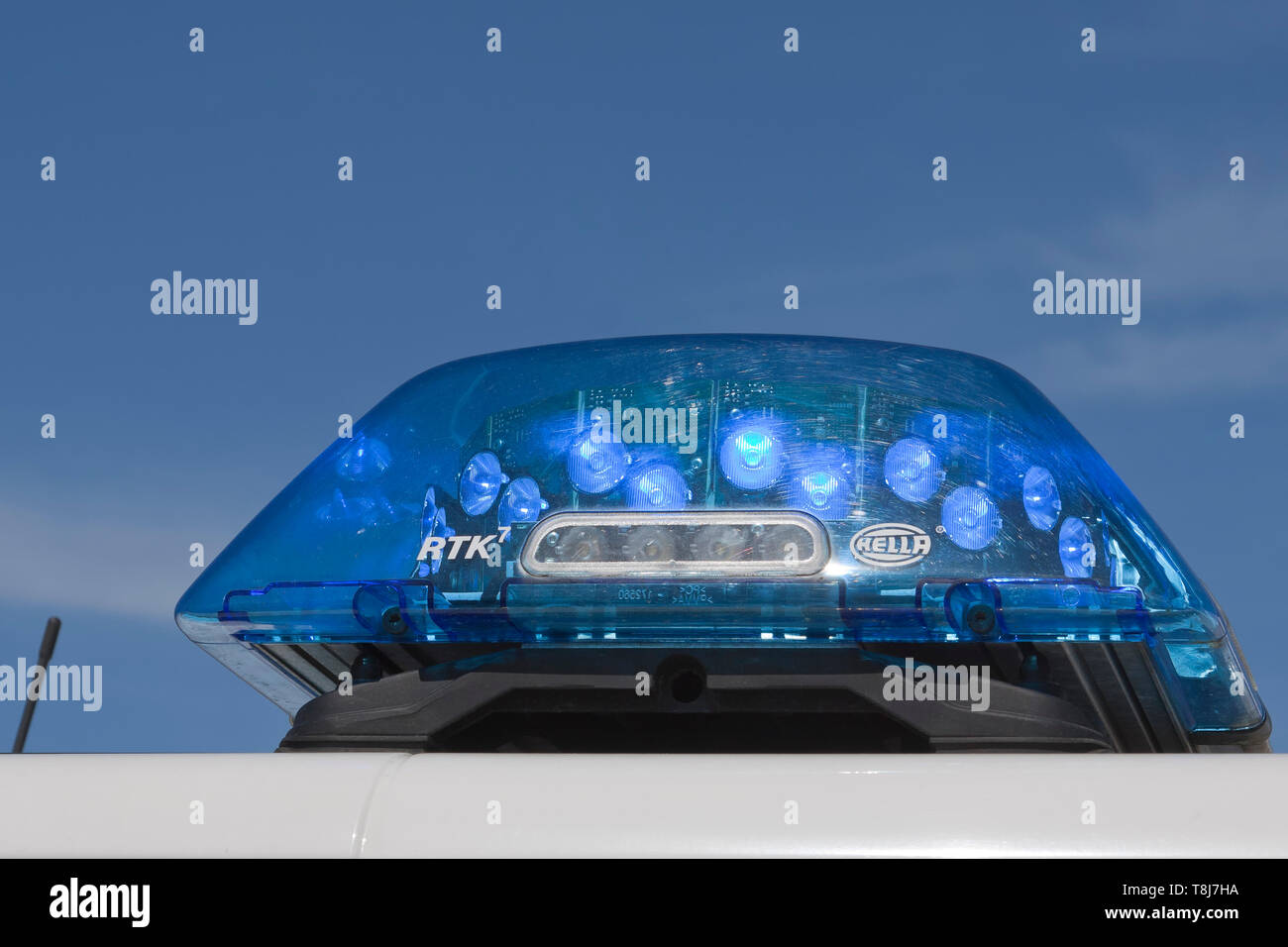 Blue lights on a roof of a car Stock Photo - Alamy