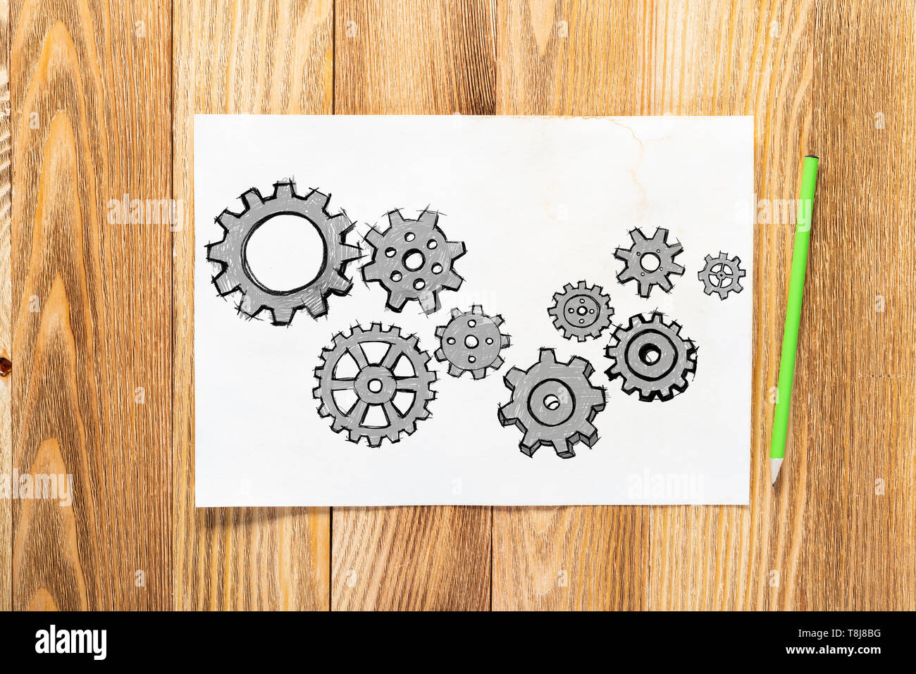Cogwheels hand drawn illustration on paper sheet Stock Photo - Alamy Cogwheels hand drawn illustration on paper sheet Stock Photo - Alamy