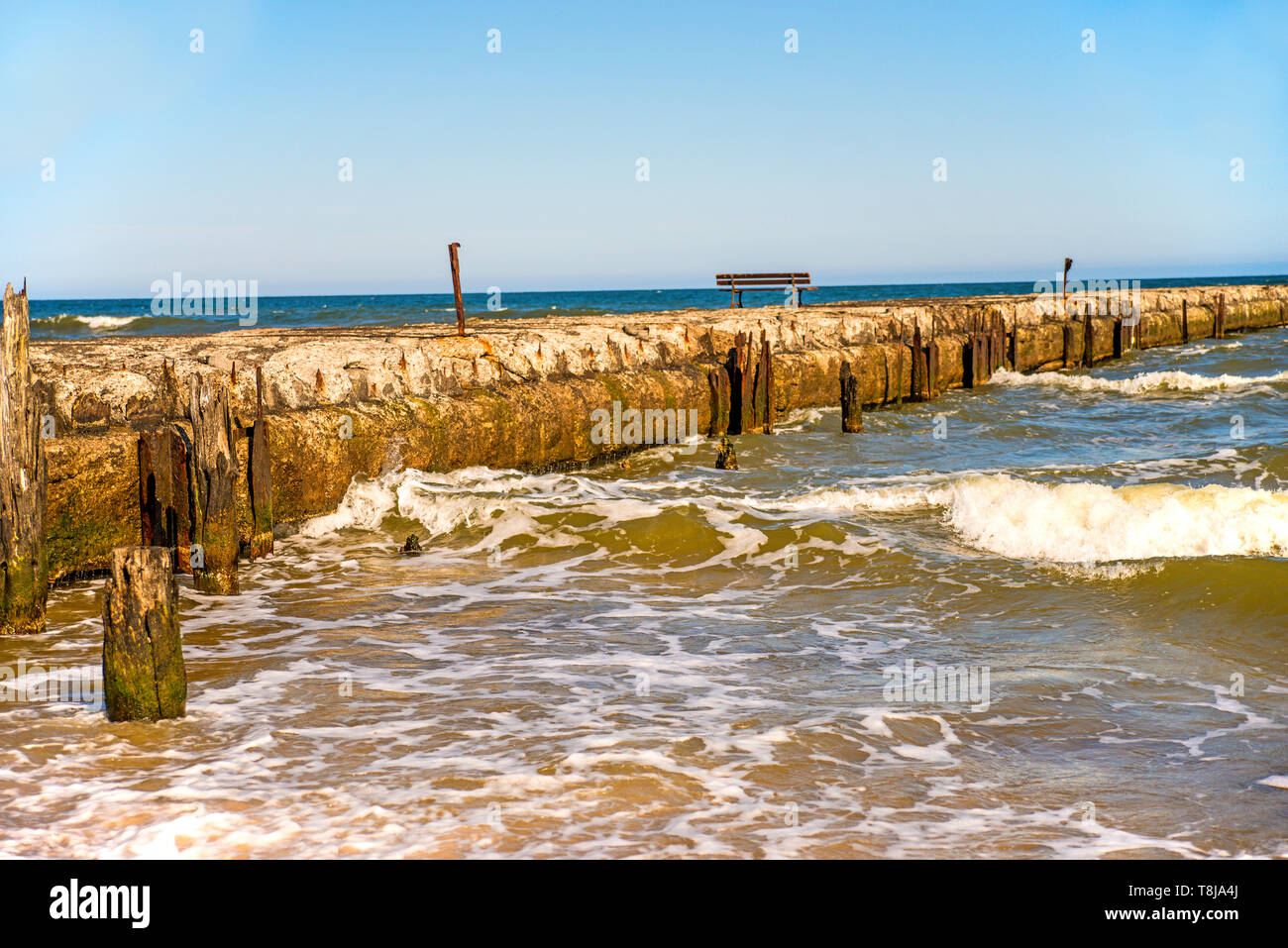 surf at an old German mole from ww2 in Poland Stock Photo - Alamy
