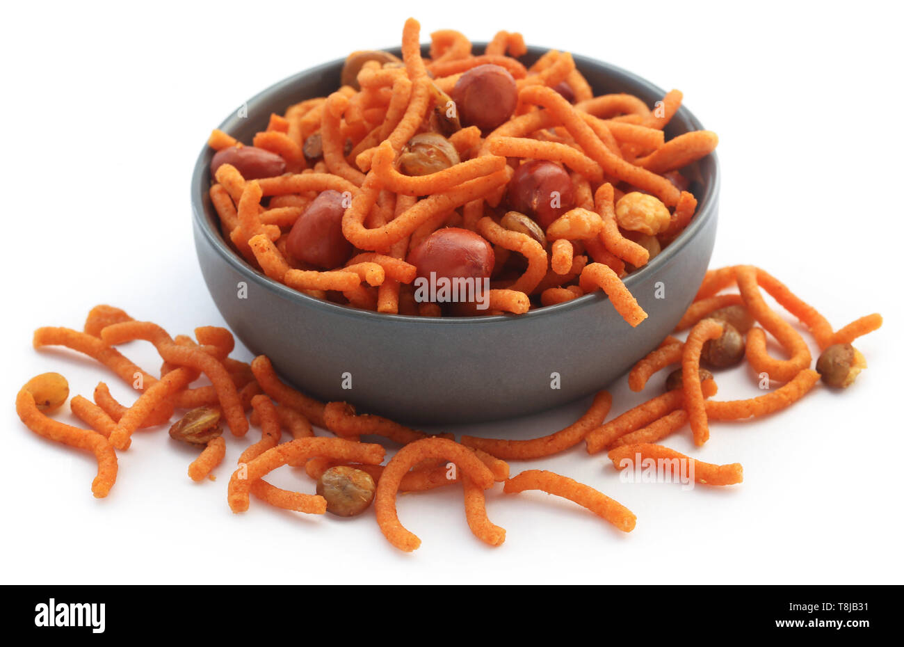 Bombay mix in a bowl over white background Stock Photo - Alamy