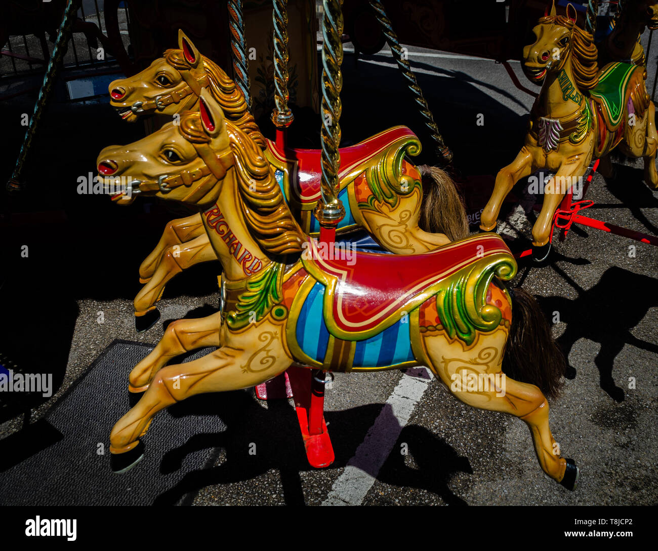 Riding on carousel horse hi-res stock photography and images - Alamy