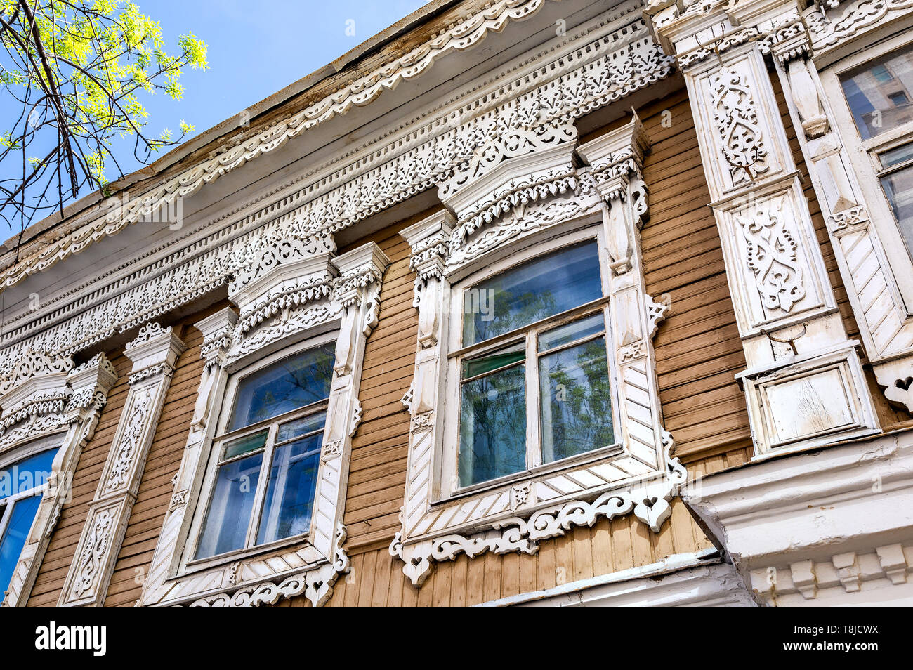 Russian traditional wooden architecture. Facade of an old house ...