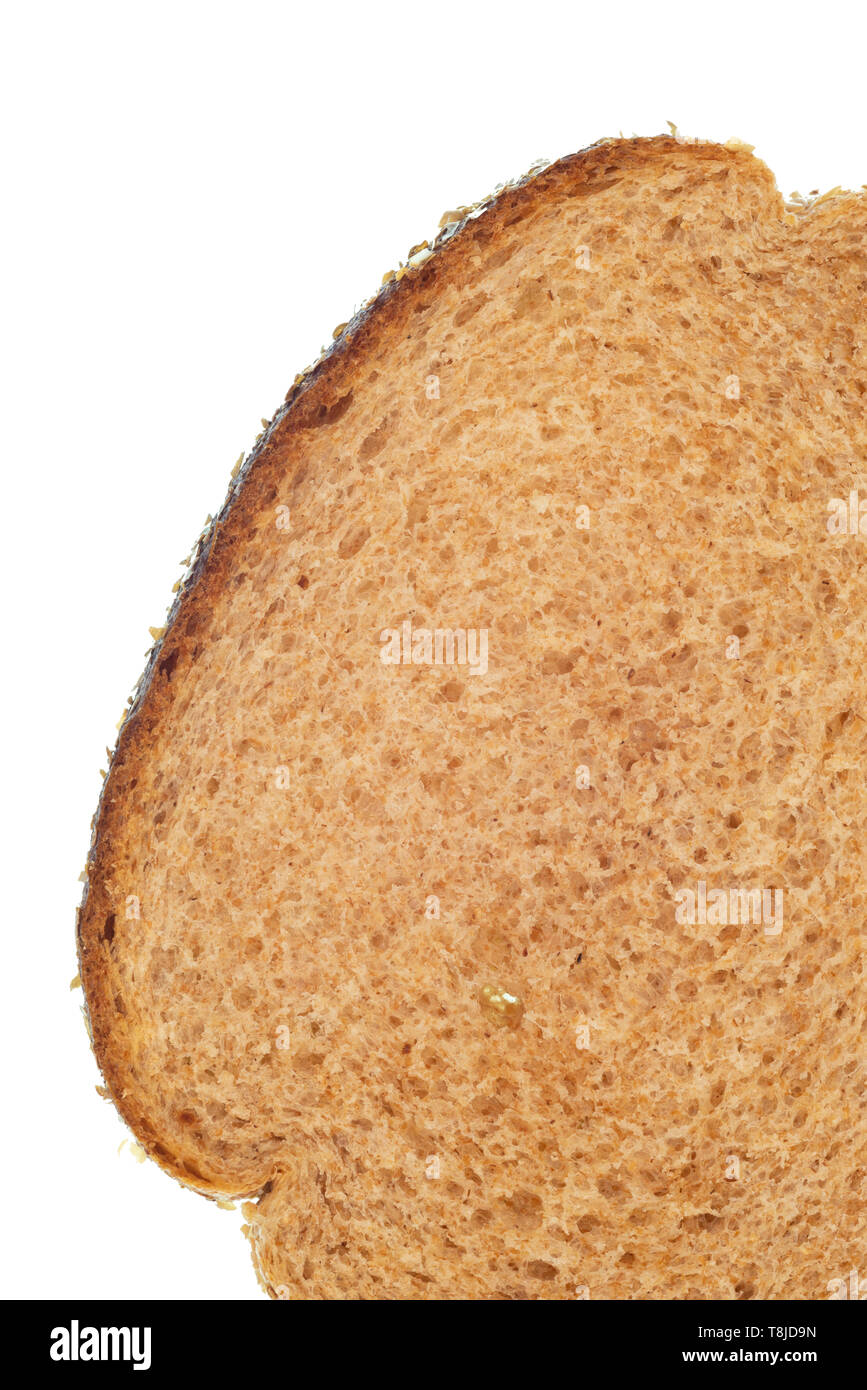 Vertical close-up shot of a slice of whole wheat bread. White ...