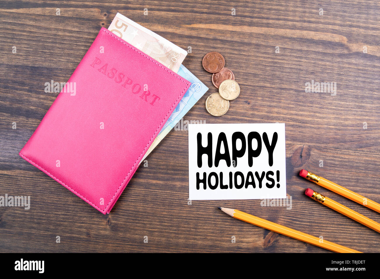 Happy holidays. Euro money and passport Stock Photo - Alamy