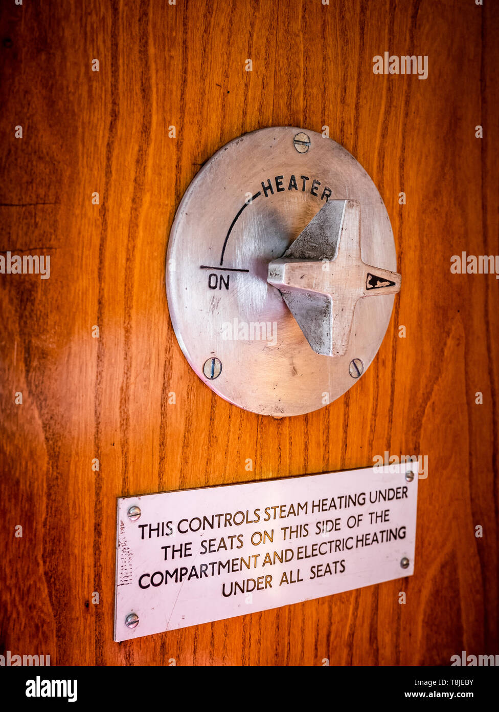Steam train passenger under seating heating control panel Stock Photo ...