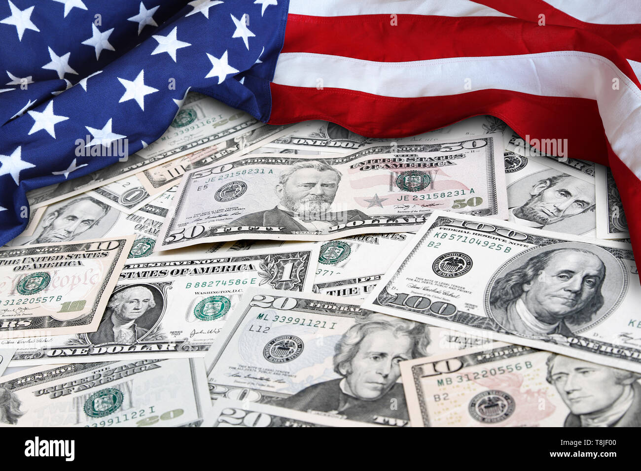 American flag and assorted American banknotes Stock Photo - Alamy