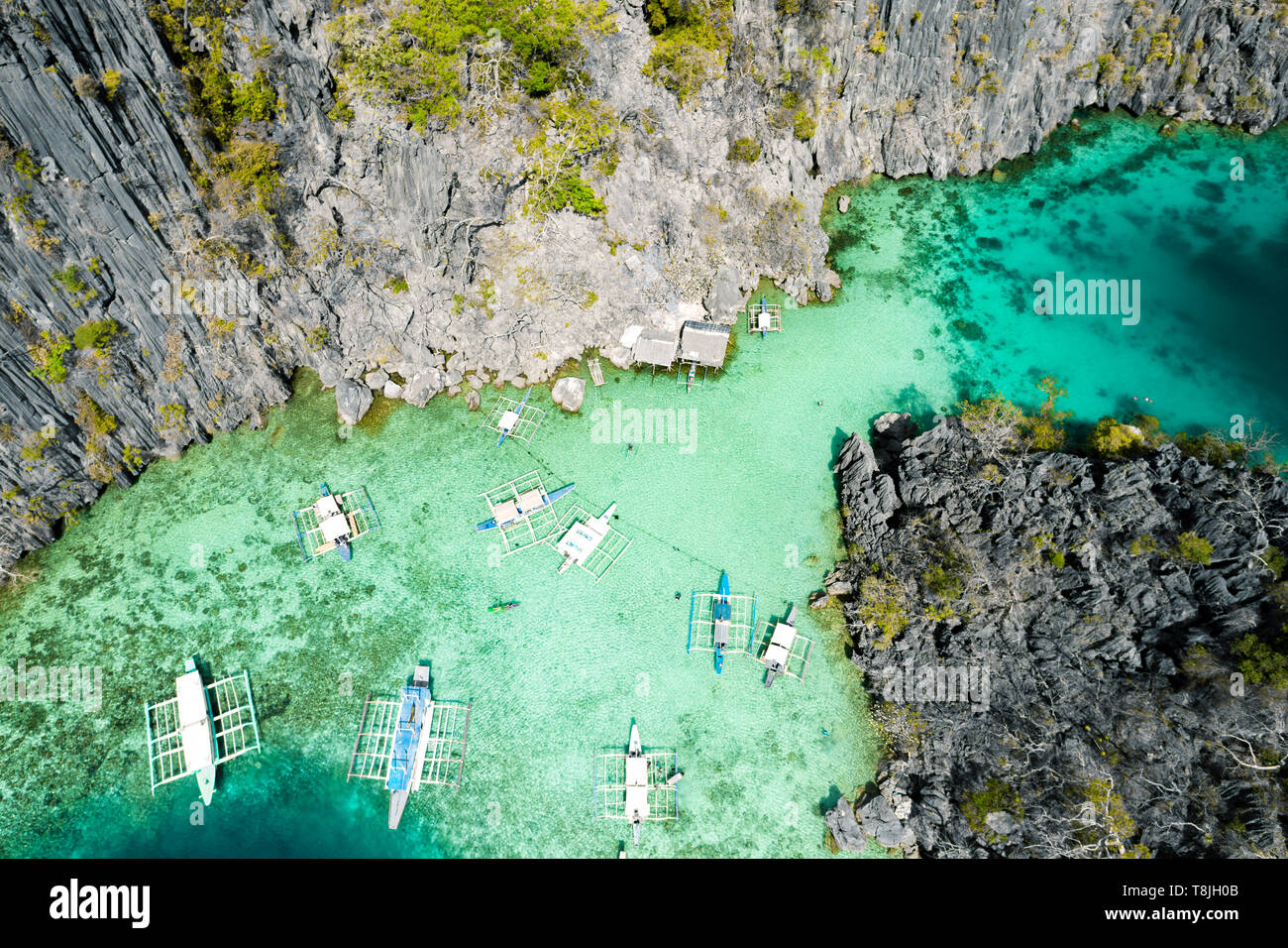 Aerial view of beautiful lagoons and limestone cliffs of Coron, Palawan ...