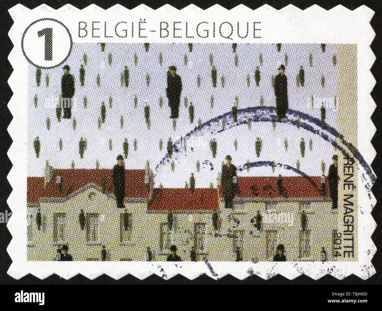 Masterpiece by Magritte on belgian postage stamp Stock Photo - Alamy