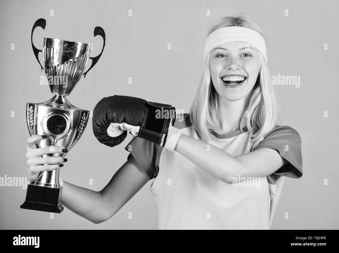 Celebrate victory. Boxing champion. Athletic girl boxing glove and ...