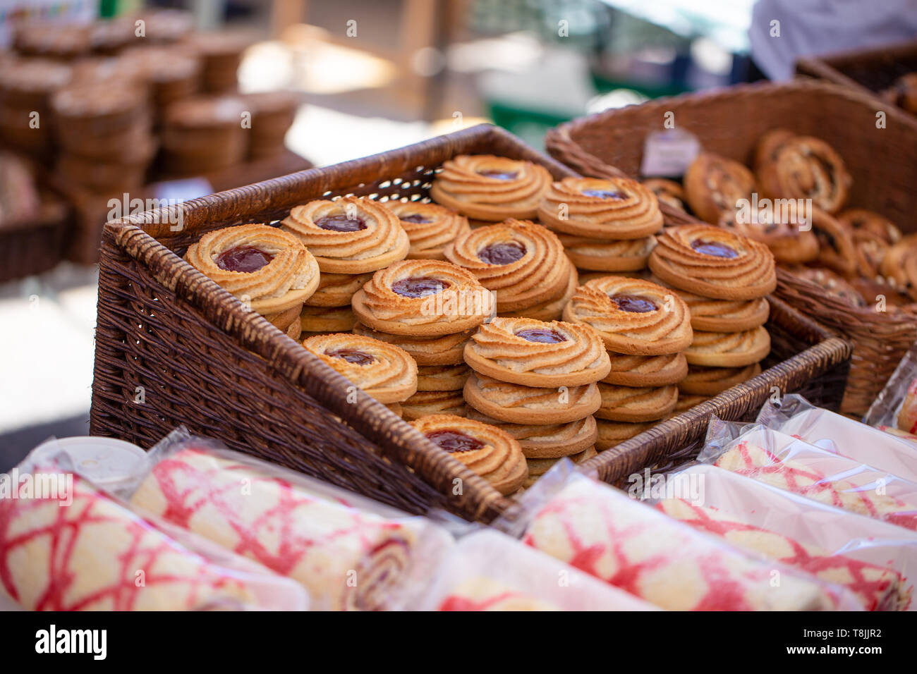 Strawberry biscuits on market table at spring, outdoors Stock Photo - Alamy