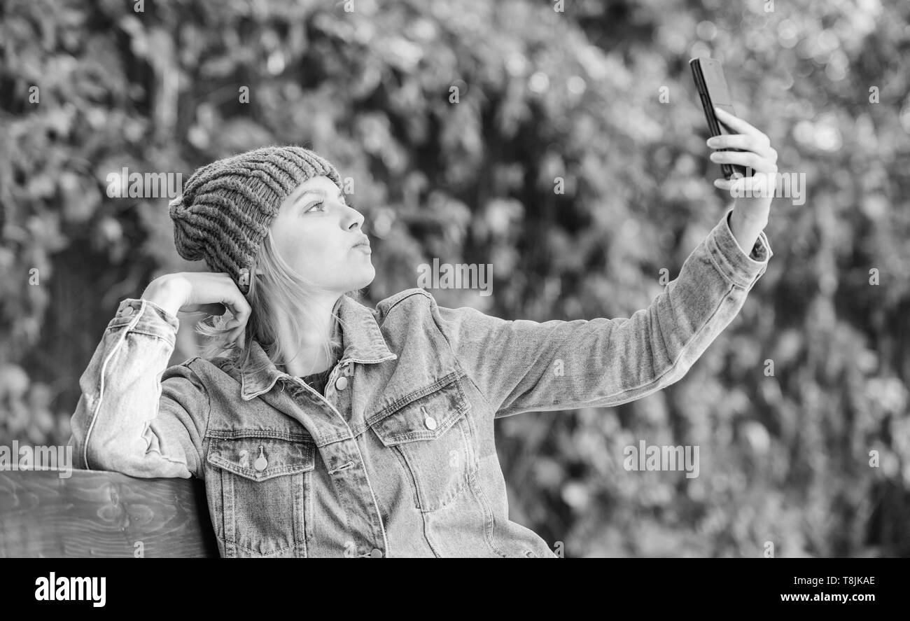 Girl with smartphone green nature background. Woman having mobile ...