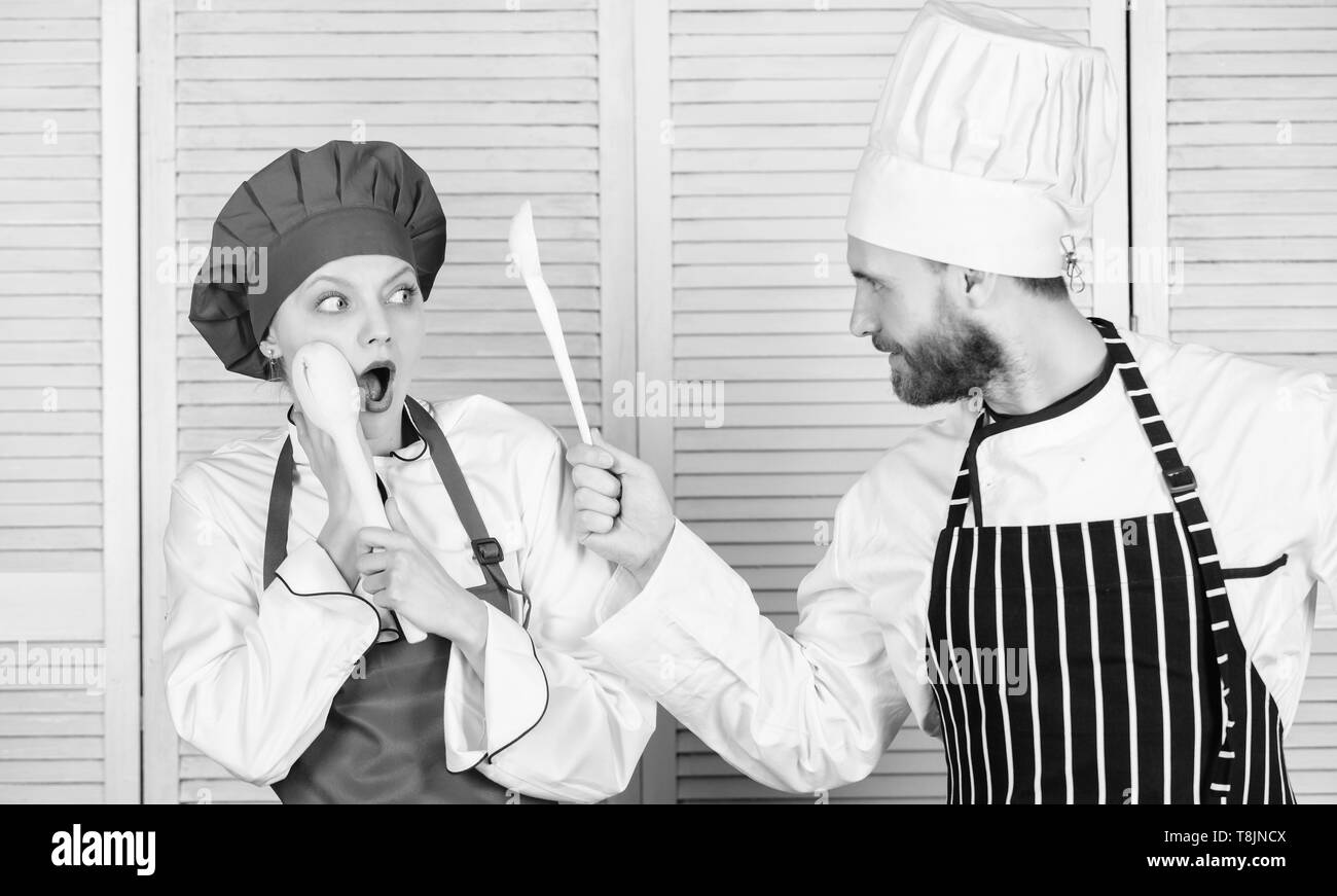 Kitchen rules. Culinary battle concept. Woman and bearded man culinary ...