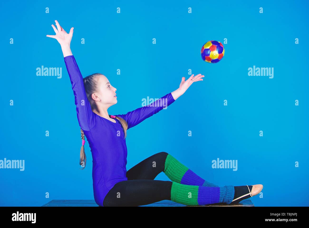 Just flying. Gymnastics. Happy child sportsman with ball. Sport and ...
