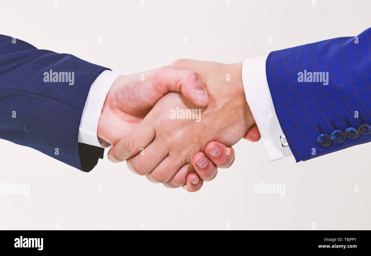 Shaking hands at meeting. Friendly handshake gesture. Handshake after ...