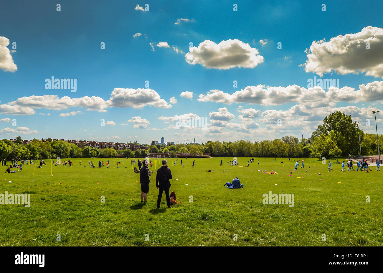 Children playing football in london hi-res stock photography and images ...