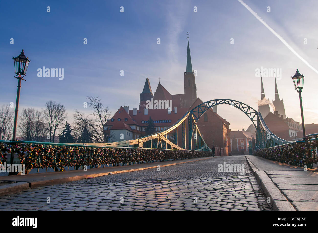 Tumski Bridge and Cathedral of St. John the Baptist twin towers on Ostrow Tumski. Wroclaw ...