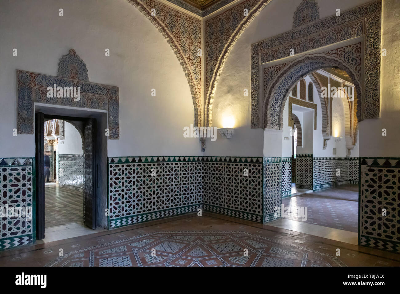 The intricate detailed Interior walls of the Alcazar Seville Spain ...