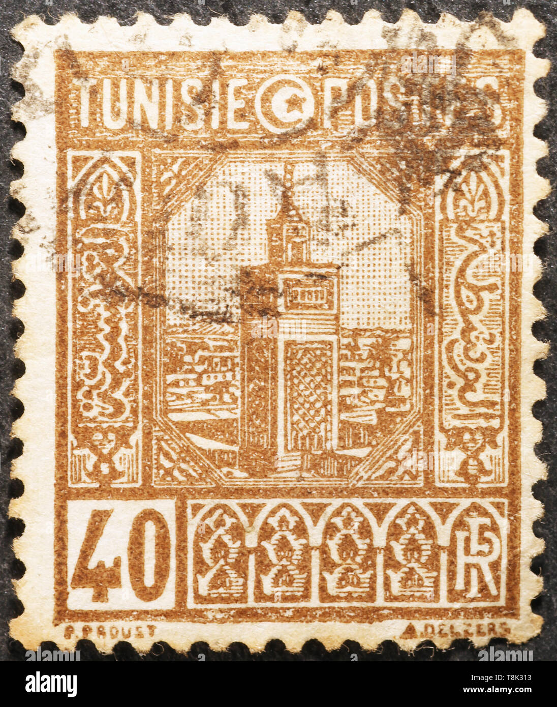 Minaret on ancient tunisian postage stamp Stock Photo - Alamy