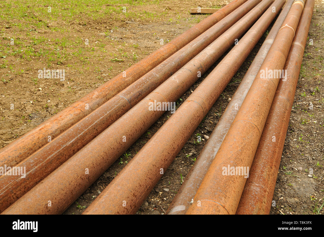 Metal rusty pipes lying in hi-res stock photography and images - Alamy
