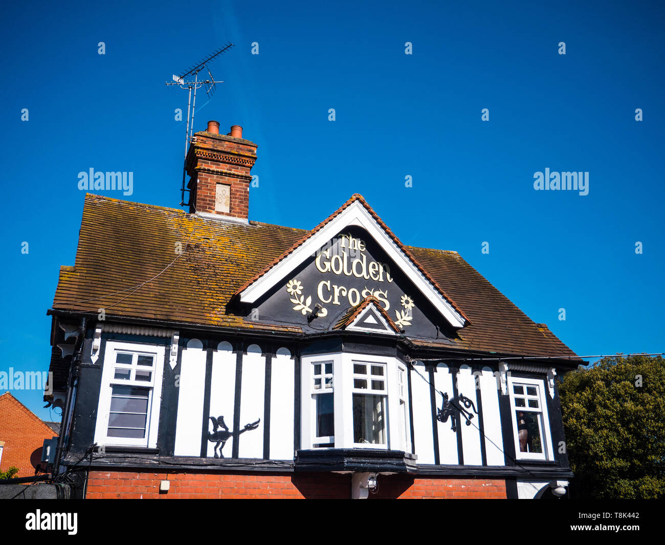 The golden pub cross hi-res stock photography and images - Alamy