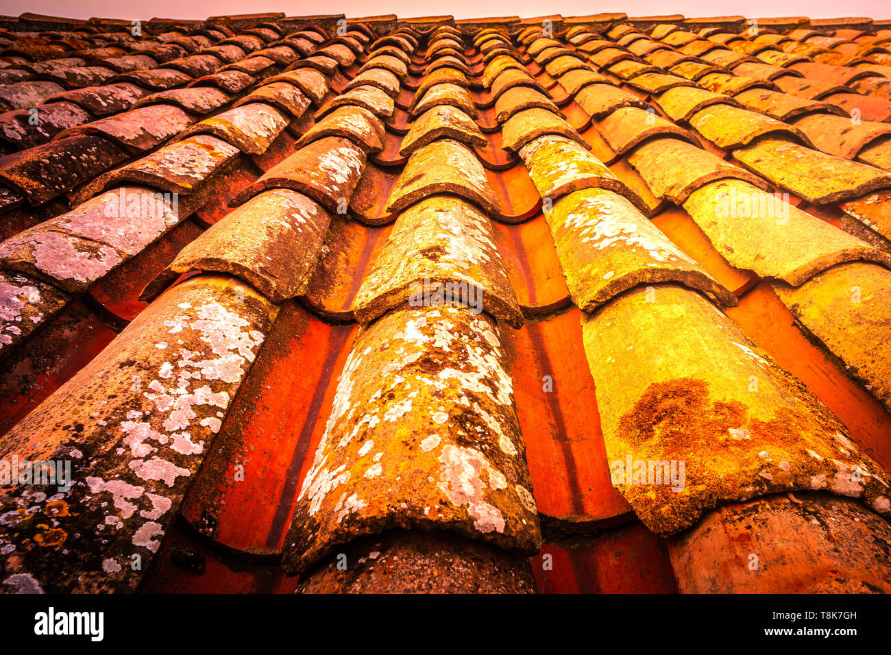Old and ruined roofs. Texture of a roof with old roof tiles. Background ...