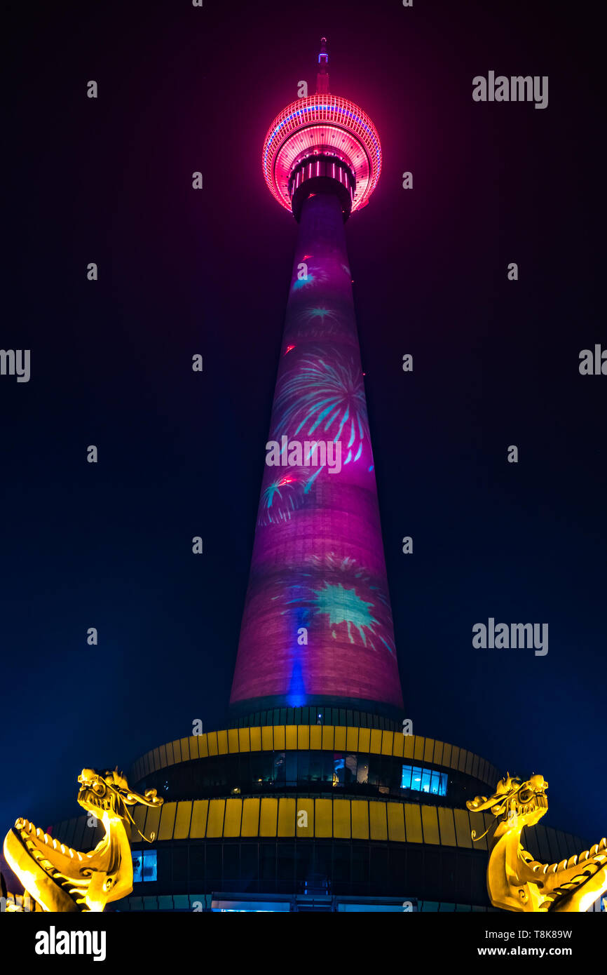 The Central Radio and Television Tower at night with colorful ...