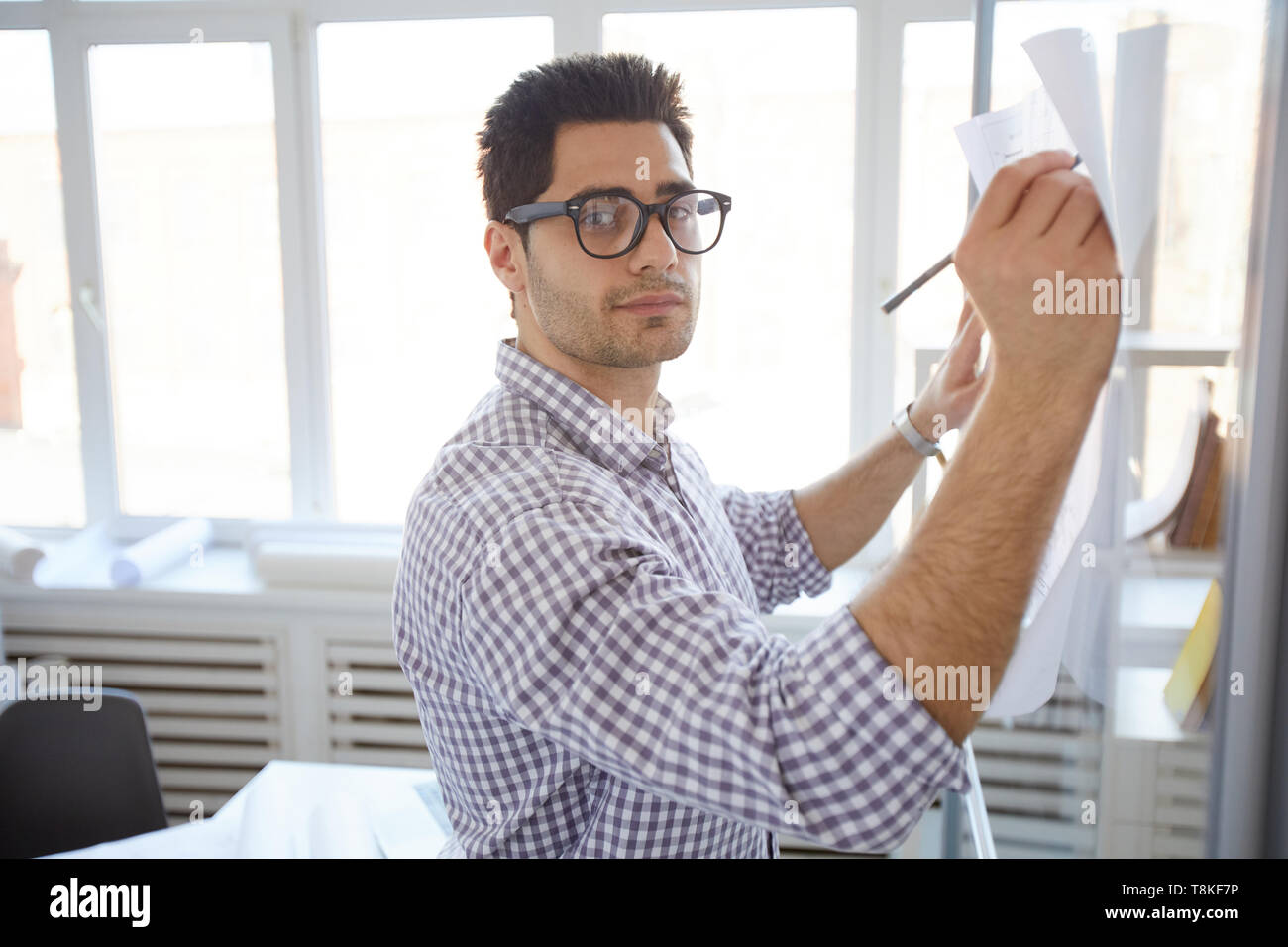 Young Engineer Looking at Camera Stock Photo - Alamy
