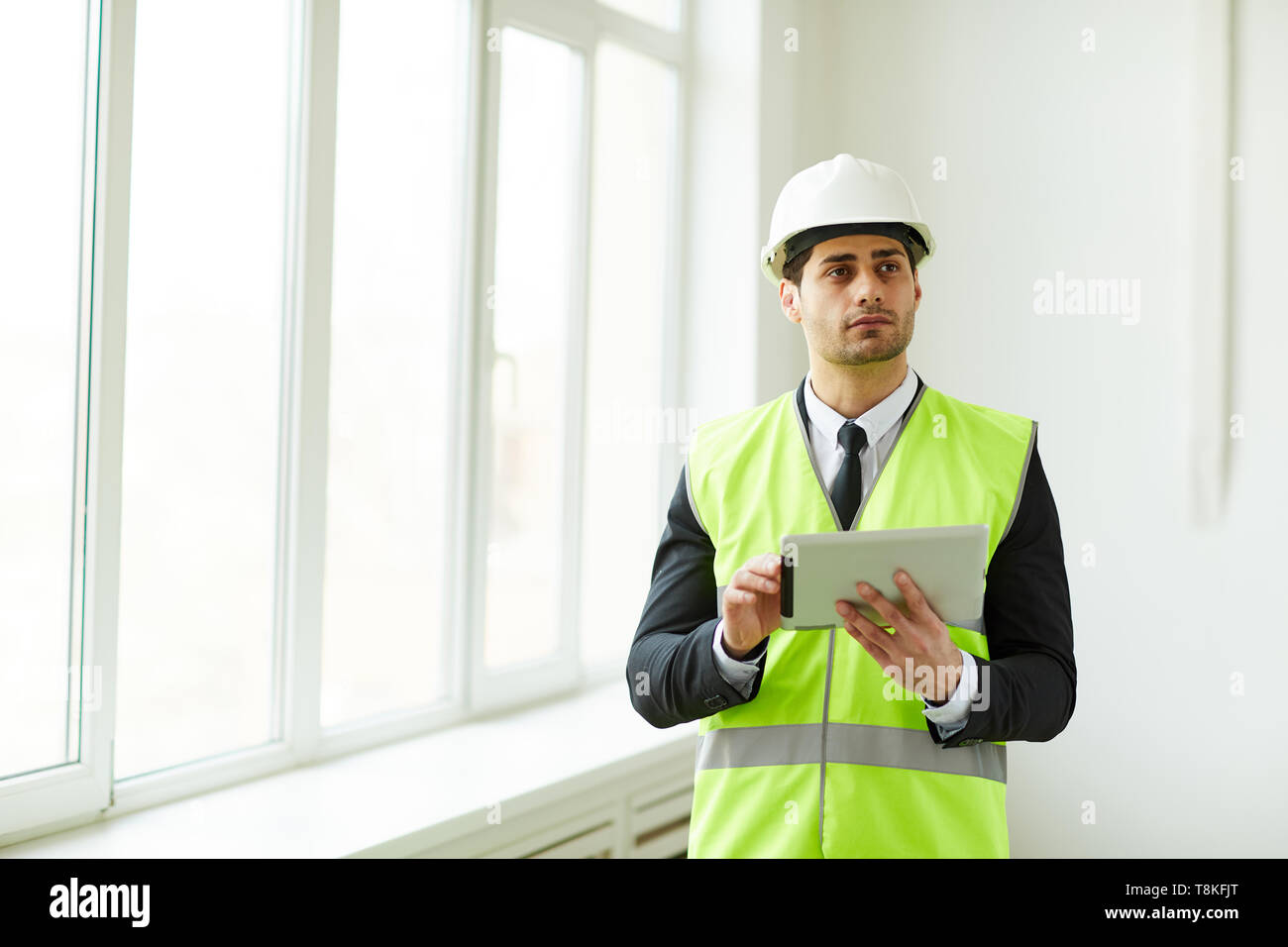 Engineer Holding Tablet Stock Photo - Alamy