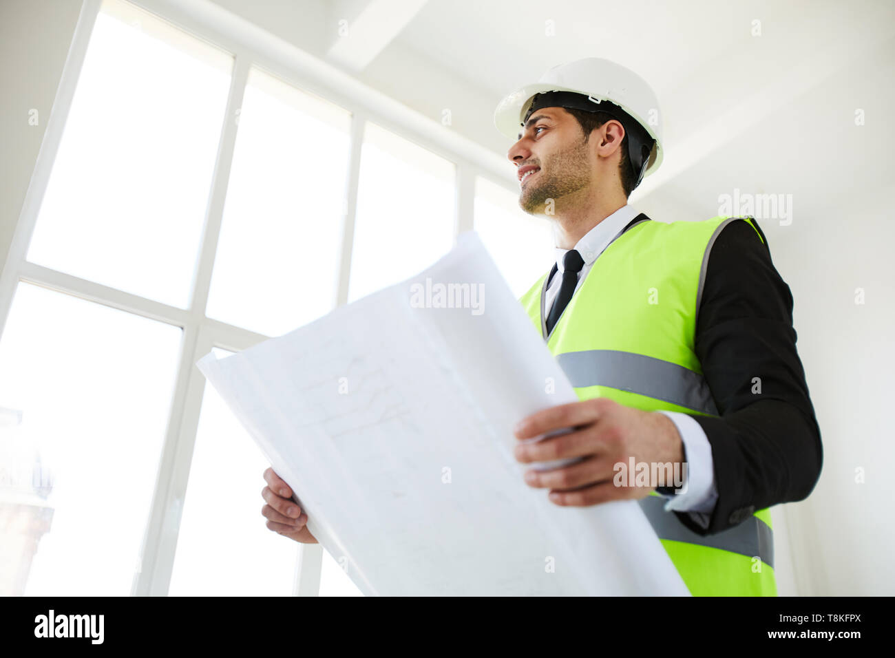 Smiling civil engineer standing hi-res stock photography and images - Alamy