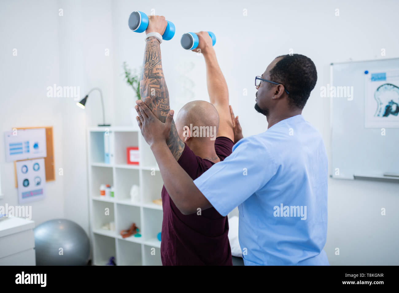 Male bodybuilder raising his arms hi-res stock photography and images ...