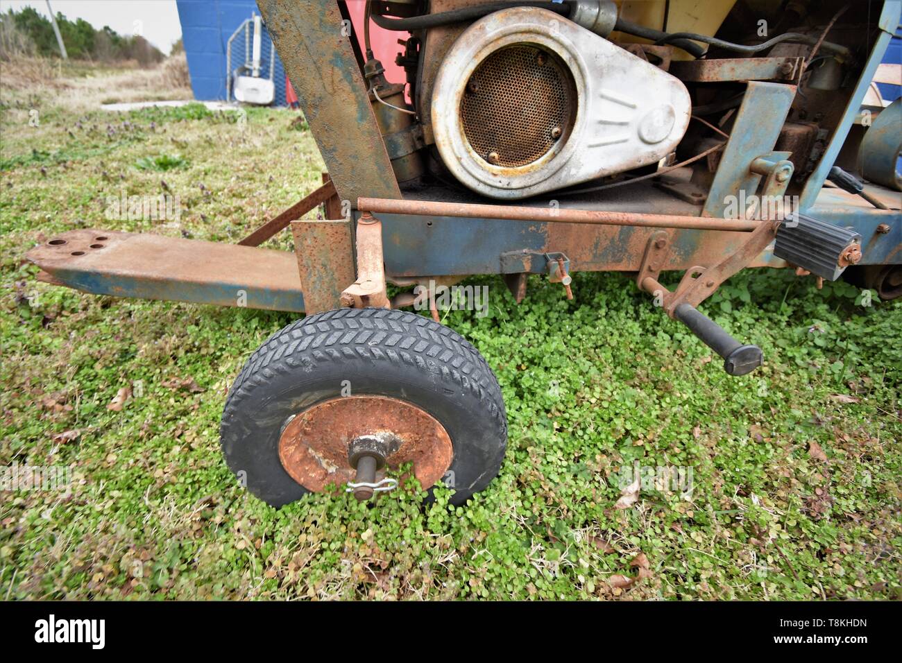 A gas powered older generator on trailer with rubber tires Stock Photo ...