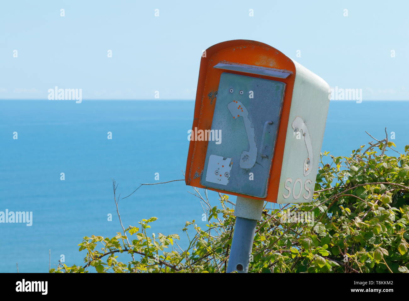 An emergency telephone box for contacting the coastguard Stock Photo ...