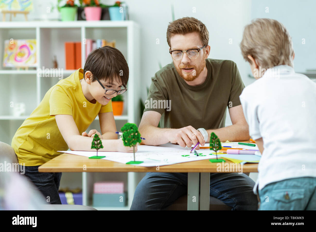 Adult observe children classroom hi-res stock photography and images ...