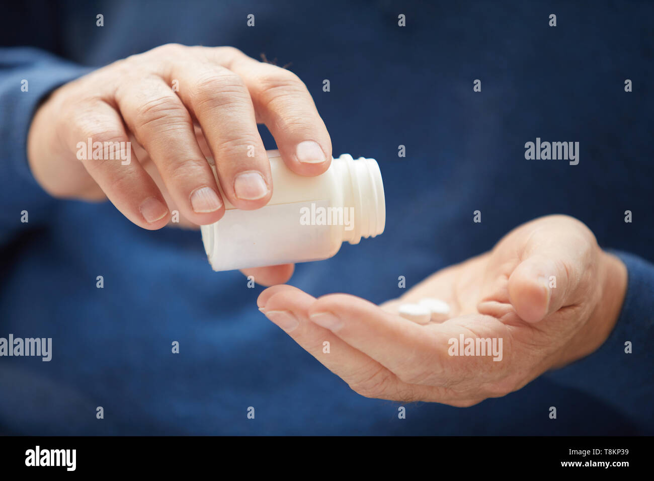 Ill mature man taking hi-res stock photography and images - Alamy