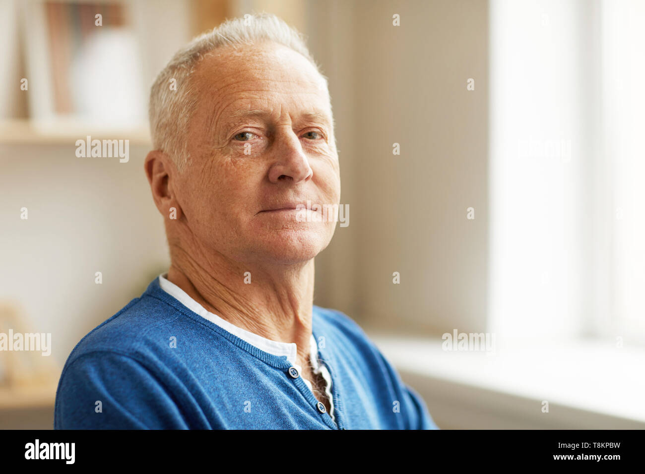 Portrait of Senior Man Indoors Stock Photo - Alamy