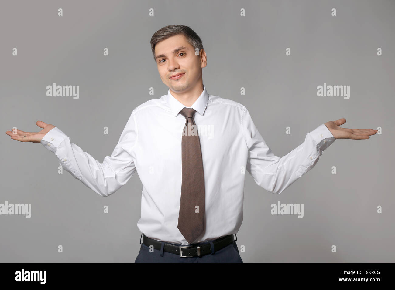 Doubtful businessman hi-res stock photography and images - Alamy