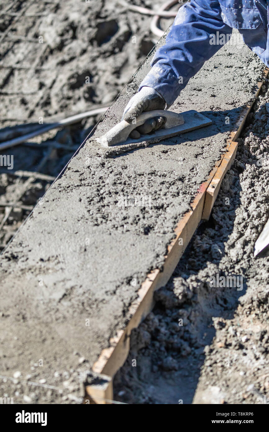 Pool Construction Worker Working With Wood Float On Wet Concrete Stock ...