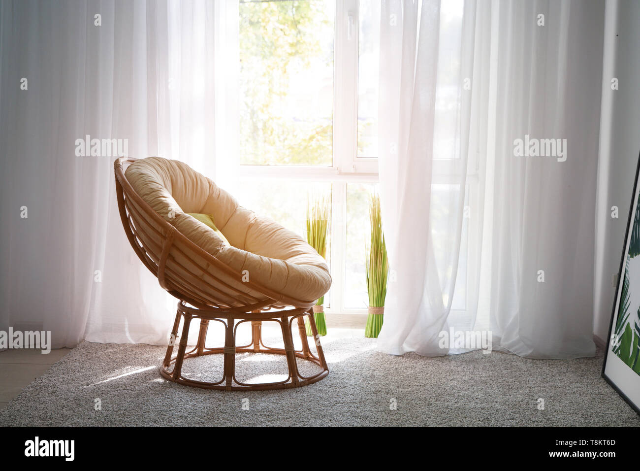 Cozy armchair for rest near window Stock Photo - Alamy