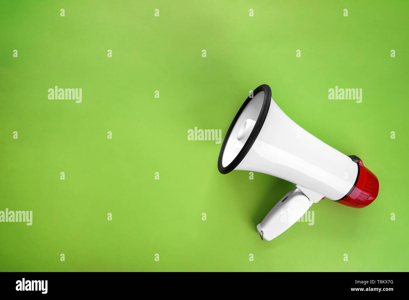 Megaphone on color background Stock Photo - Alamy